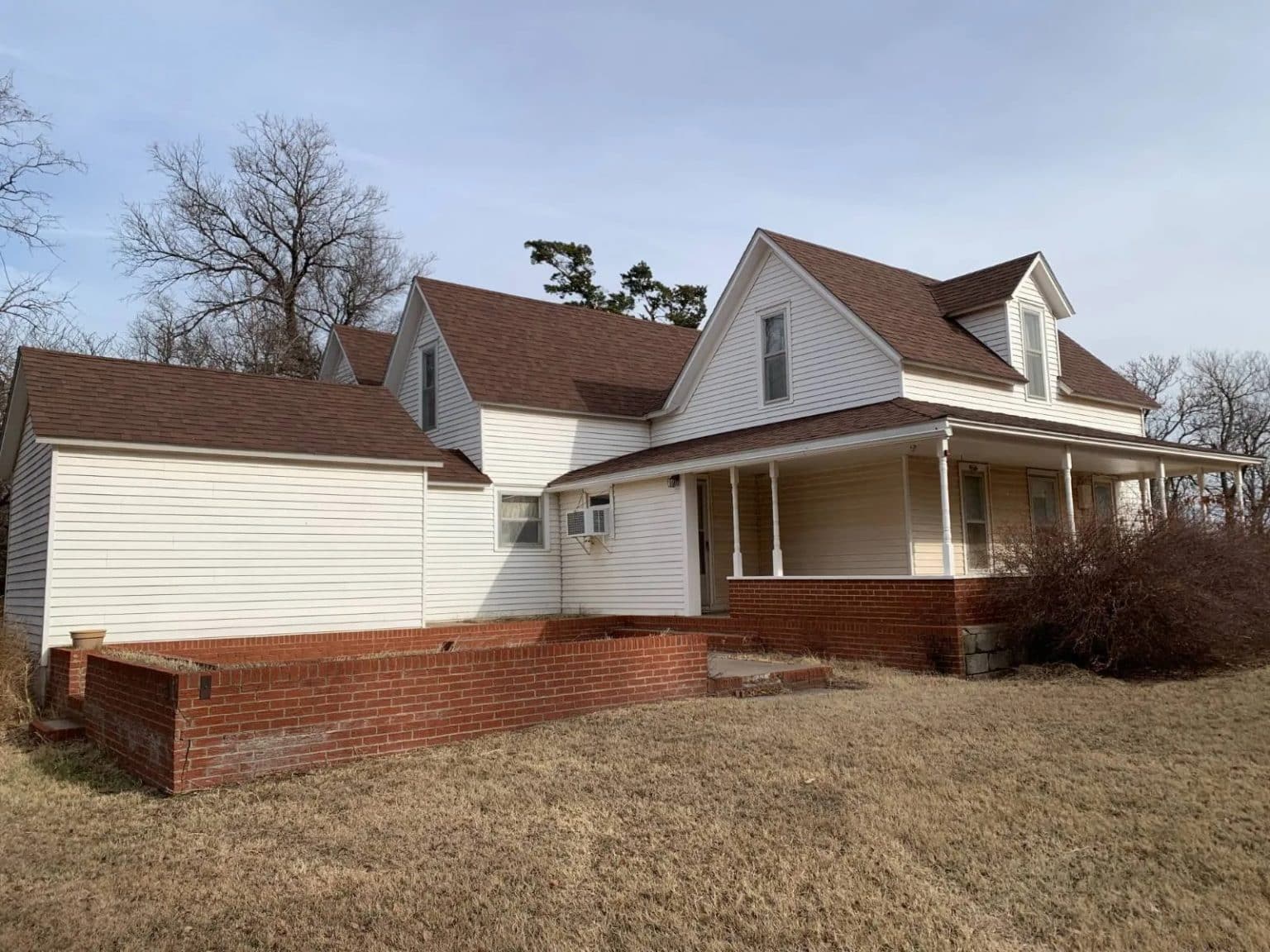 A 5-Bedroom C. 1900 Kansas Farmhouse For Sale On 5 Acres Under $101,000