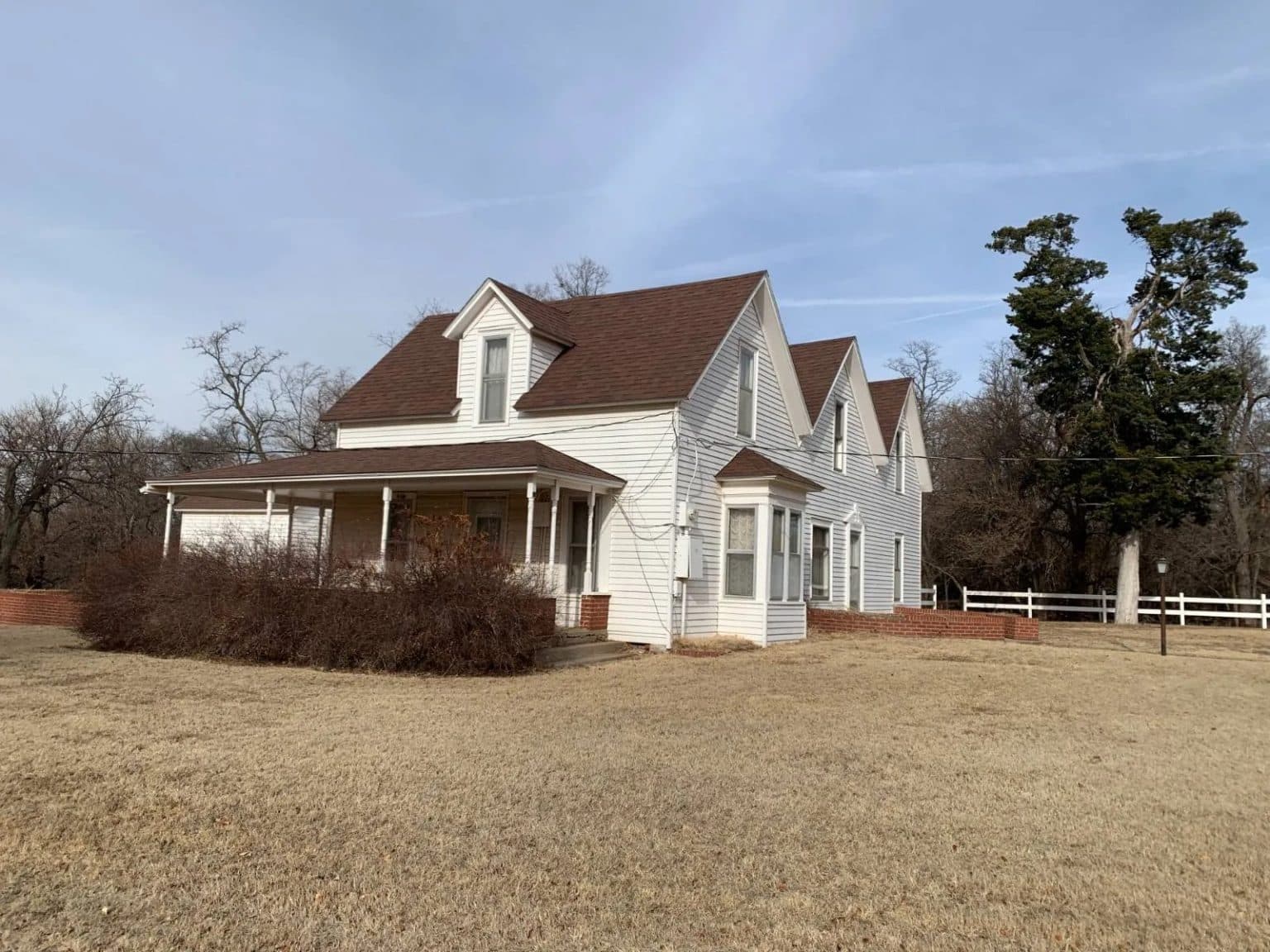 A 5-Bedroom C. 1900 Kansas Farmhouse For Sale On 5 Acres Under $101,000