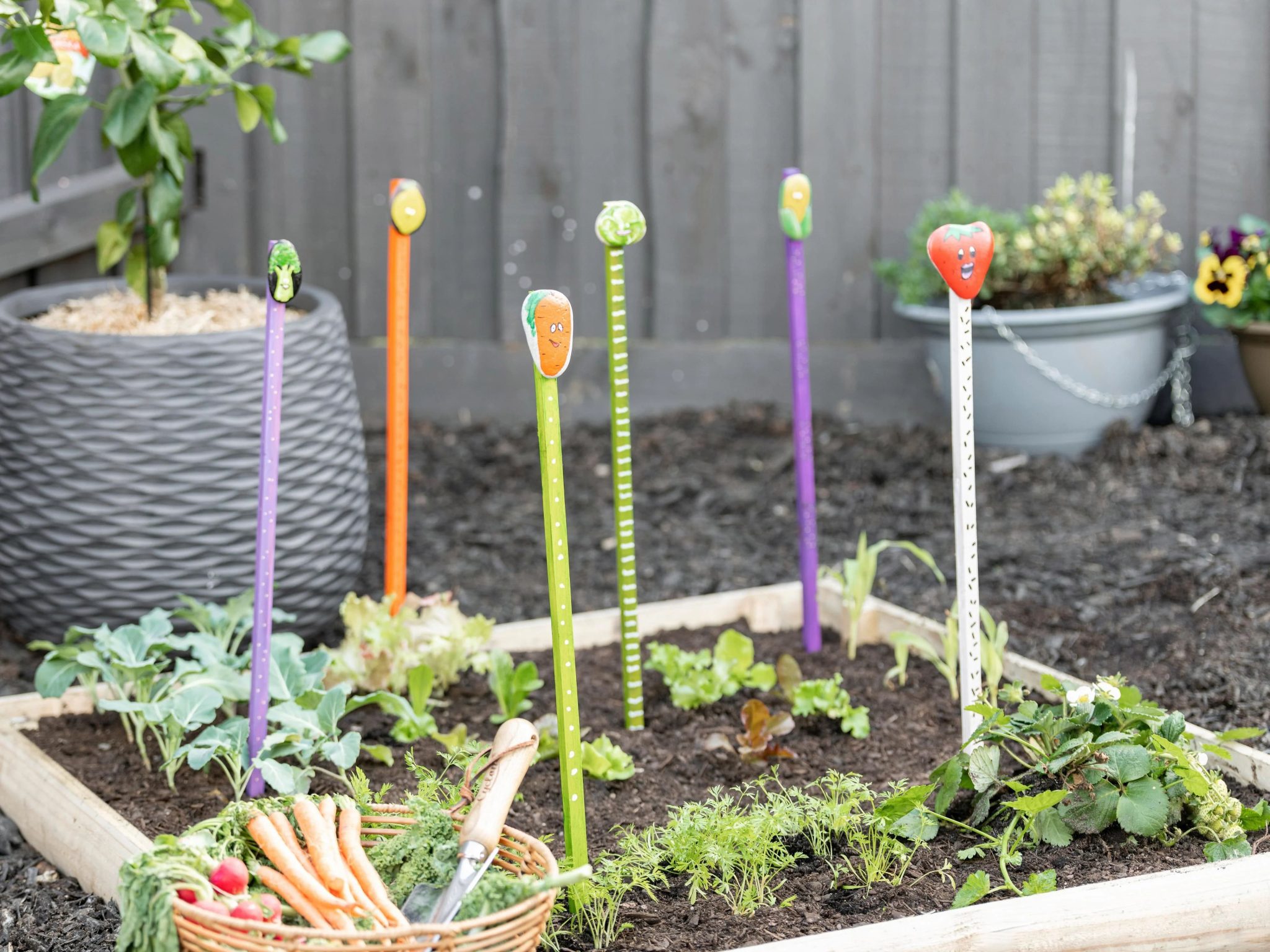 23 Fun and Colorful DIY Garden Stakes to Spruce Up Your Outdoor Space